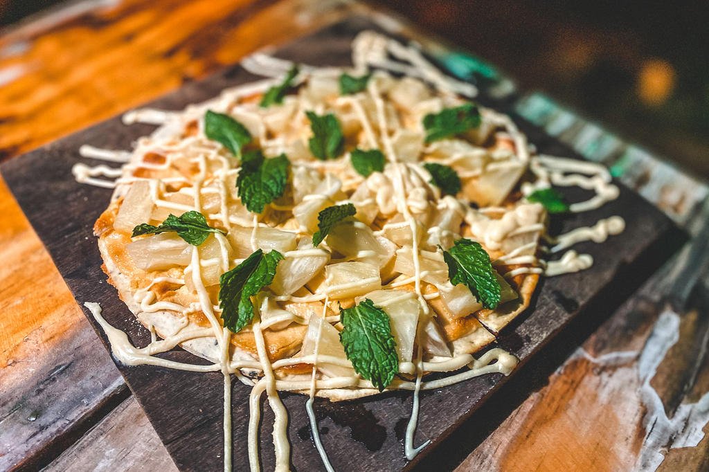 Pizza para comer com as mãos em um ambiente aconchegante: conheça o ...